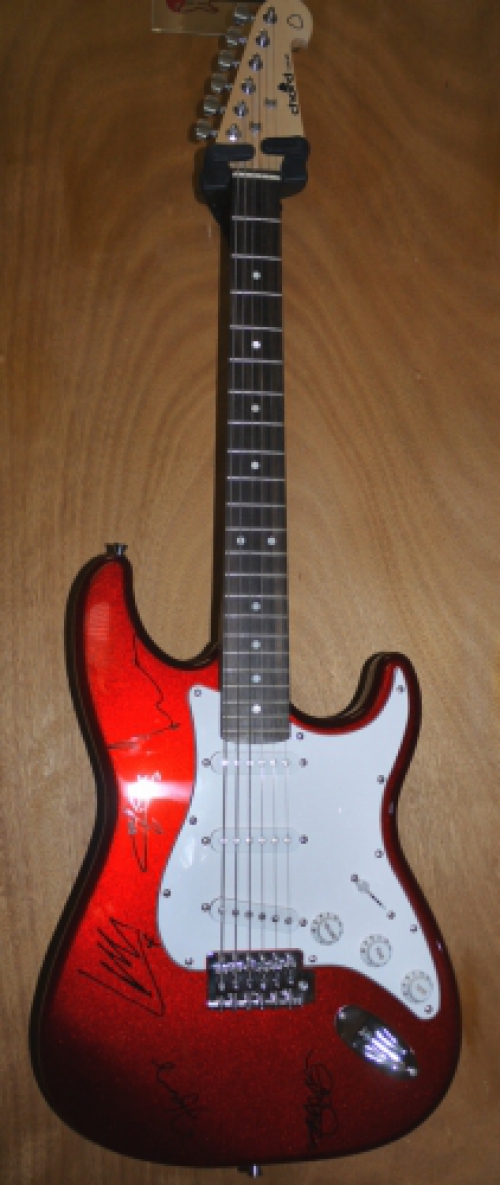 ONE DIRECTION/SIGNED ELECTRIC GUITAR/COA